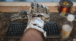 Mechanical Hand Prosthetic Blends Steampunk with Cyberpunk - Nerdist
