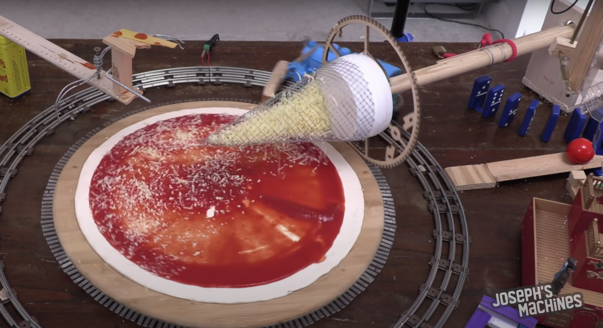 Pizza-Making Contraption Uses a Toy Train and Ferris Wheel - Nerdist