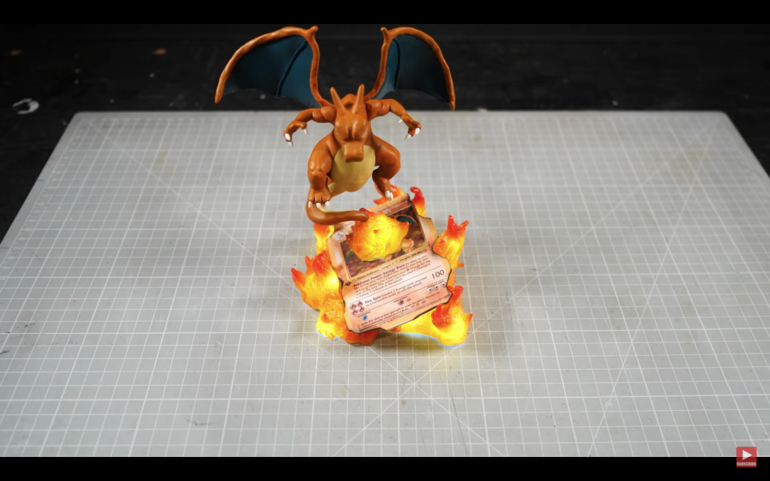 Charizard Statue Made with Fake $200,000 Card Is Fiery Fun - Nerdist